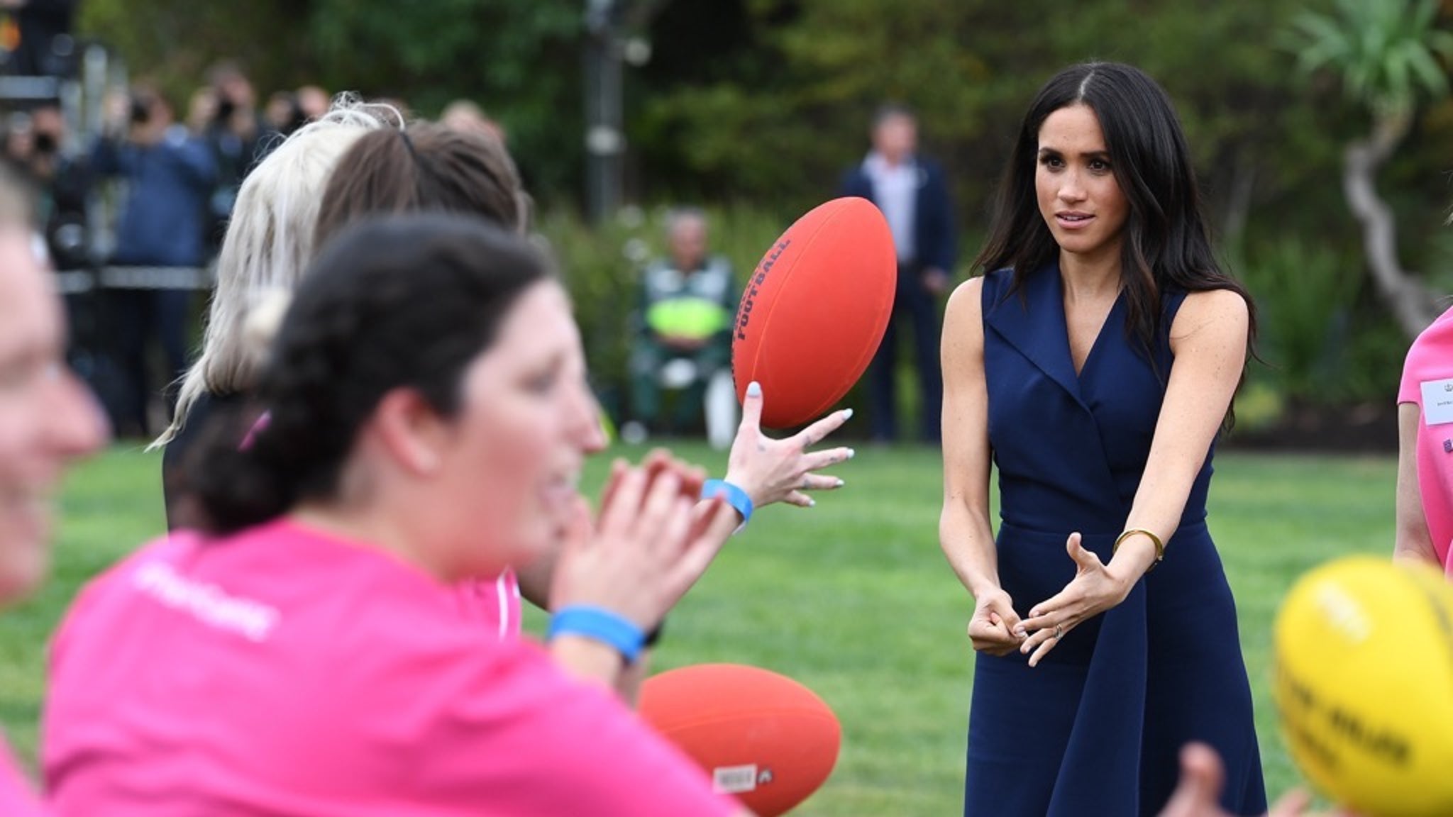 Meghan Markle Shows Off First Signs Of Baby Bump