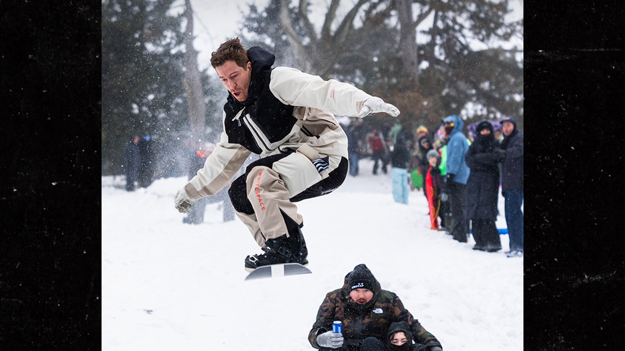 Shaun White Jumps Over Shane Gillis, Chris O'Connor While Snowboarding ...