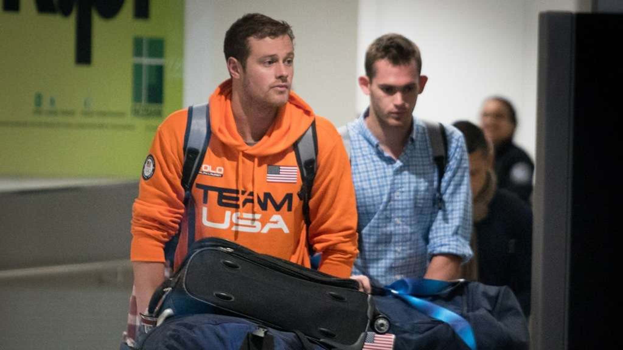 Team USA Swimmers -- Return to U.S. ... Yeah, We've Got Baggage