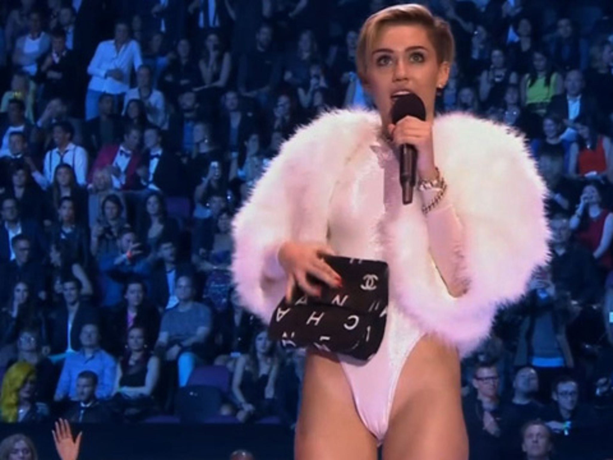 Miley Cyrus Flashes On Stage