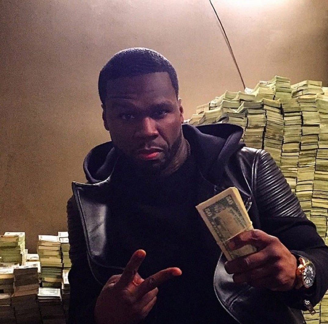 Rappers Holding Money