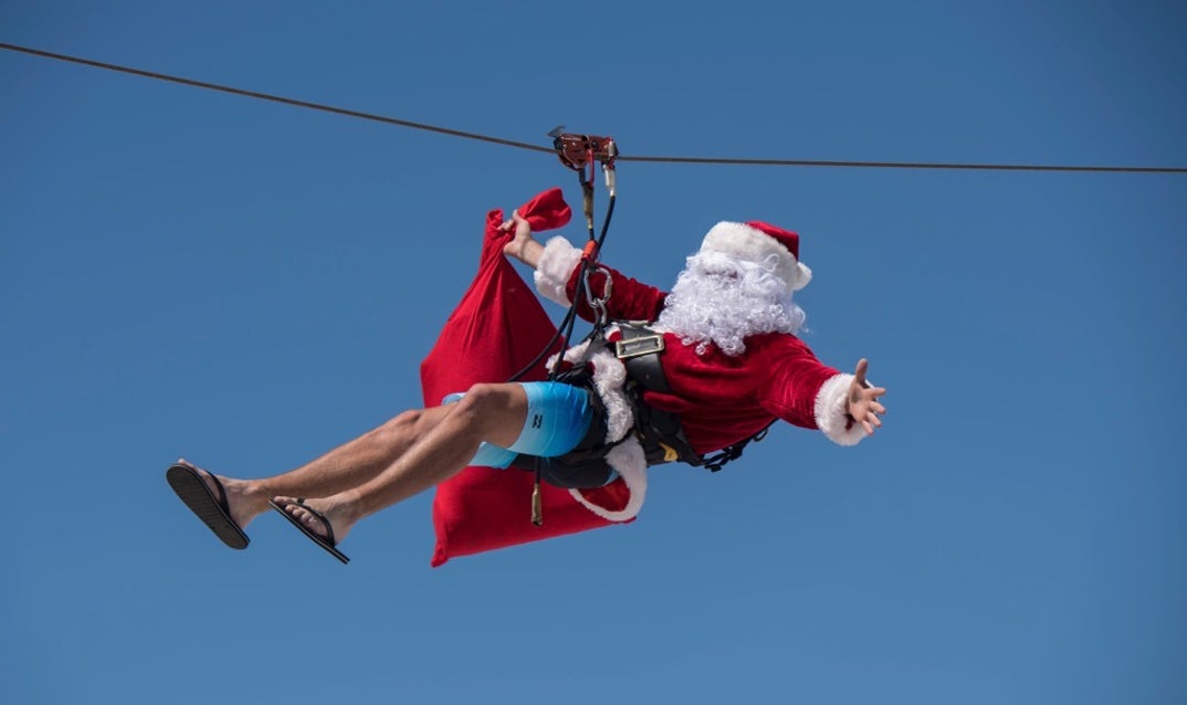 Zip Lining Santa -- Ho Ho Hold On Tight!