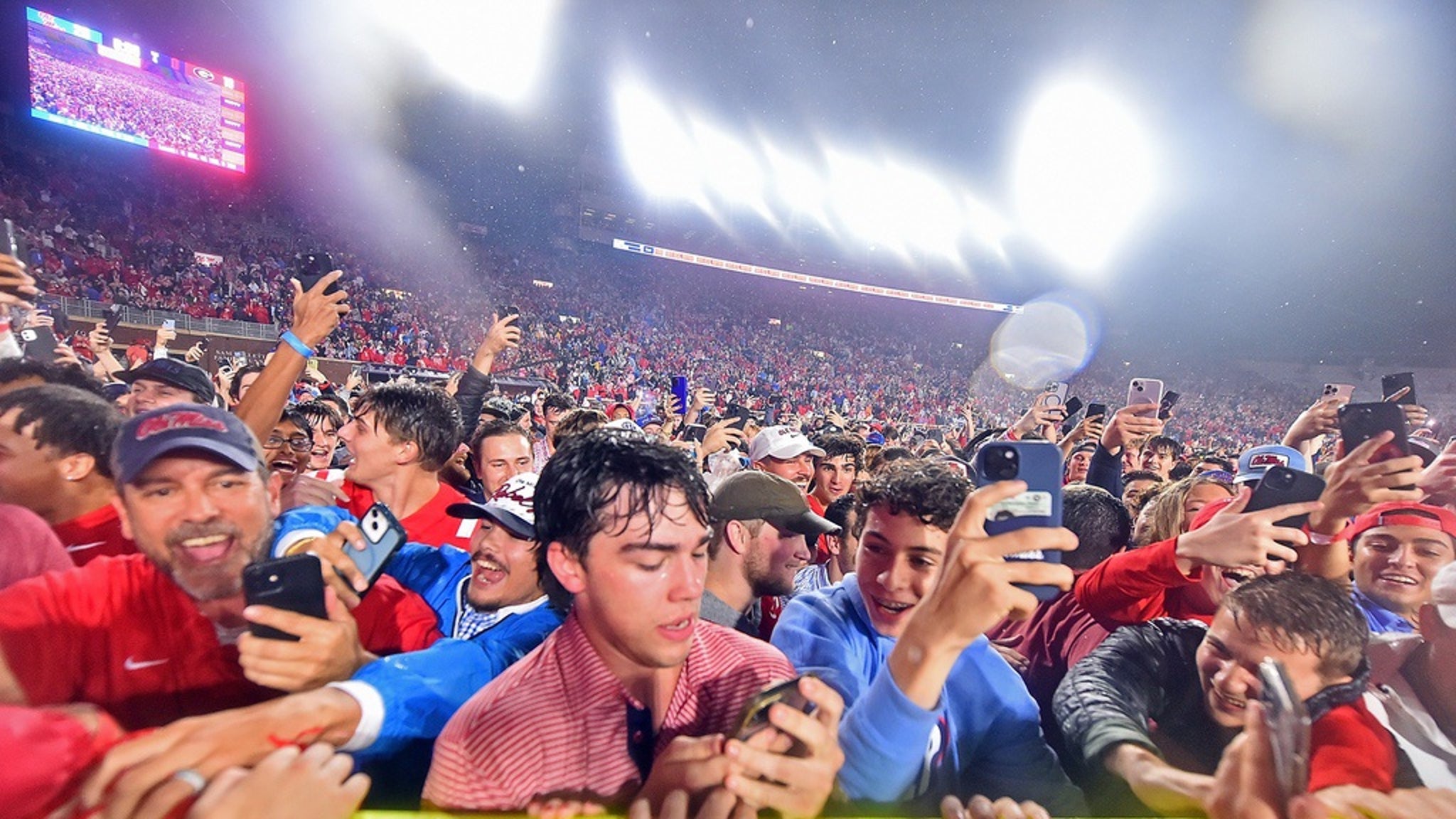Ole Miss Fans Rush Football Field During Game Vs. UGA