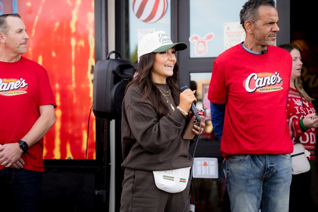 Andre Reed Hits Raising Cane's For Bike Giveaway
