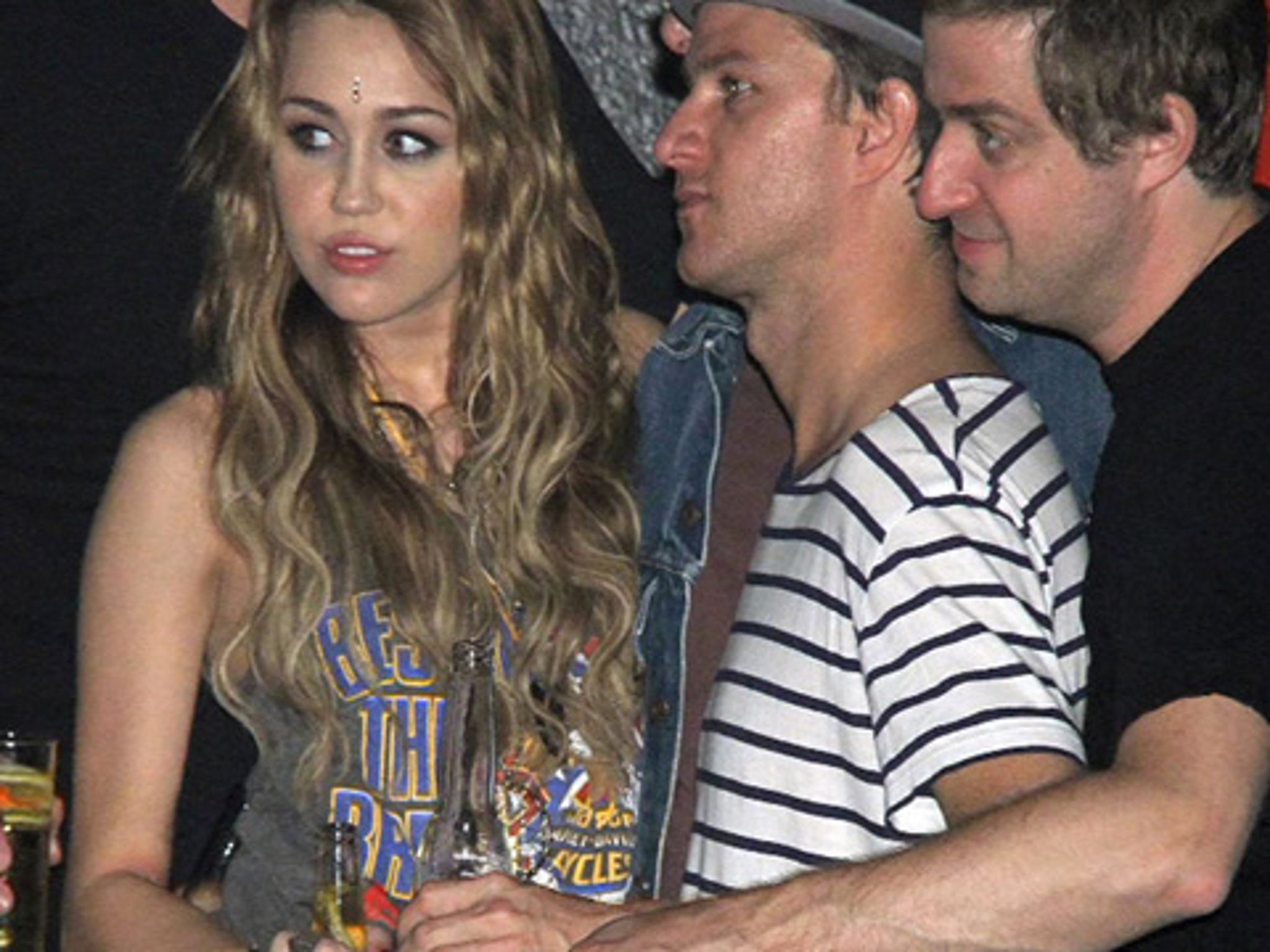 Miley Cyrus Drinking Beer