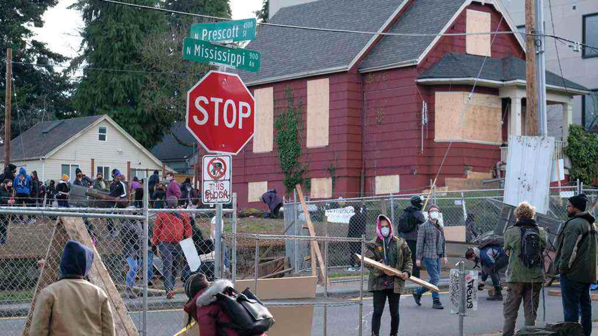 Portland Protesters Clash with Police Over 'Red House'