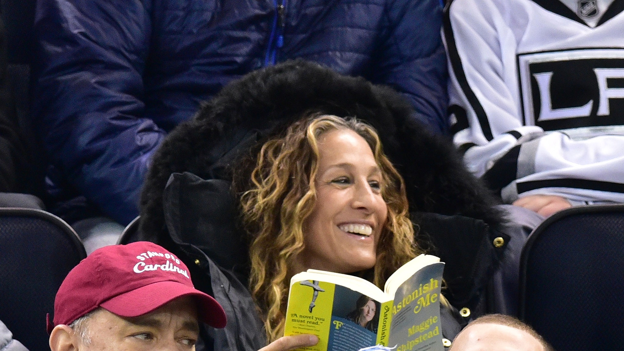 SJP reads a book at Rangers/Kings game