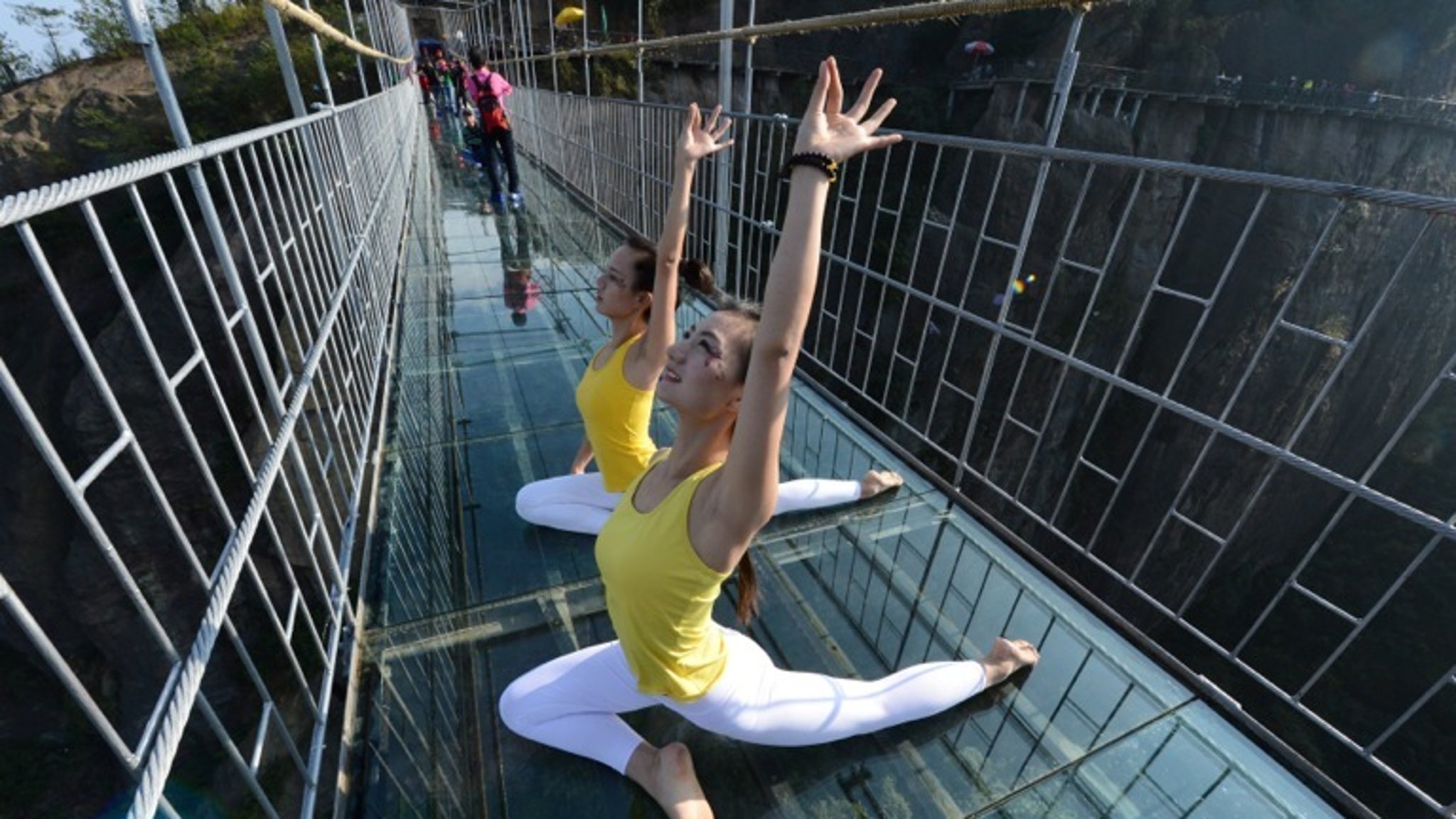 Spandex Clad Yogis Stretch on Sketchy Bridge -- The Suspense!
