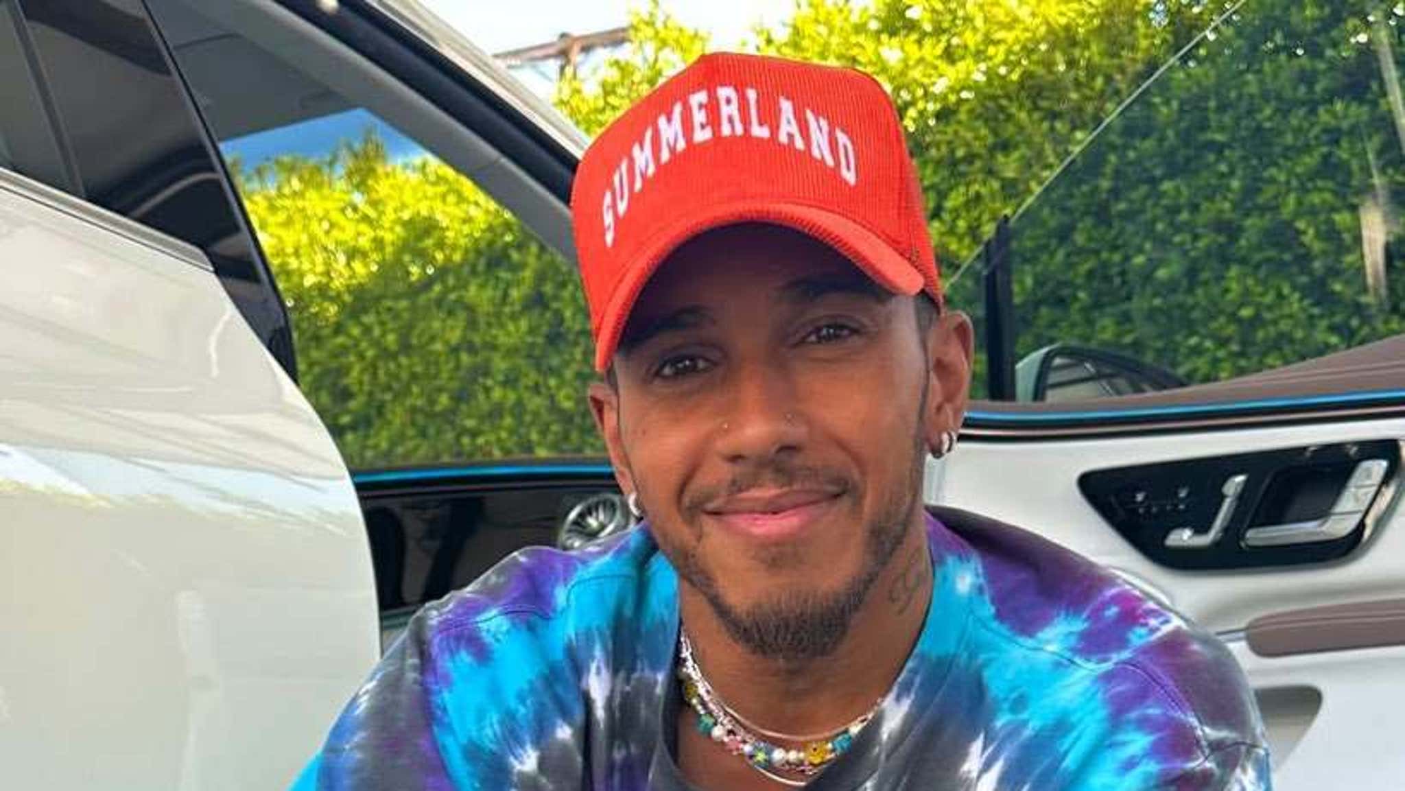 Lewis Hamilton And His Dog Roscoe