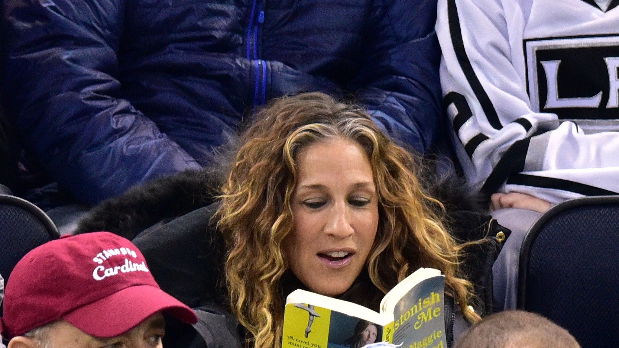 SJP reads a book at Rangers/Kings game
